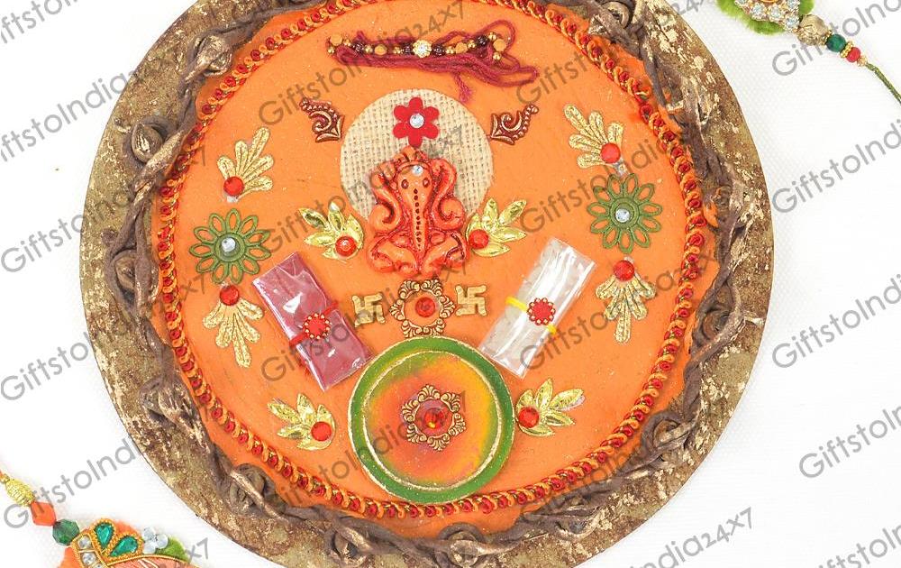 Orange Rakhi Thali with Two Alluring Rakhis for Bhaiya | Rakhi