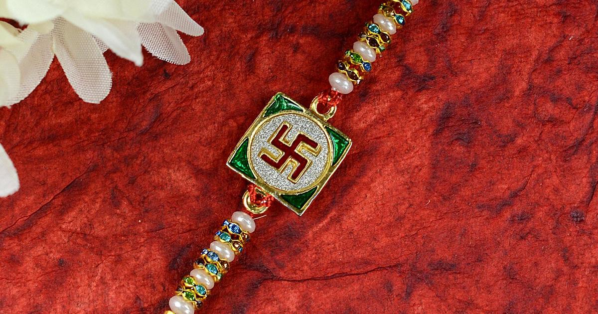 Red & Green Metallic Stones Swastik Rakhi | Divine Rakhi