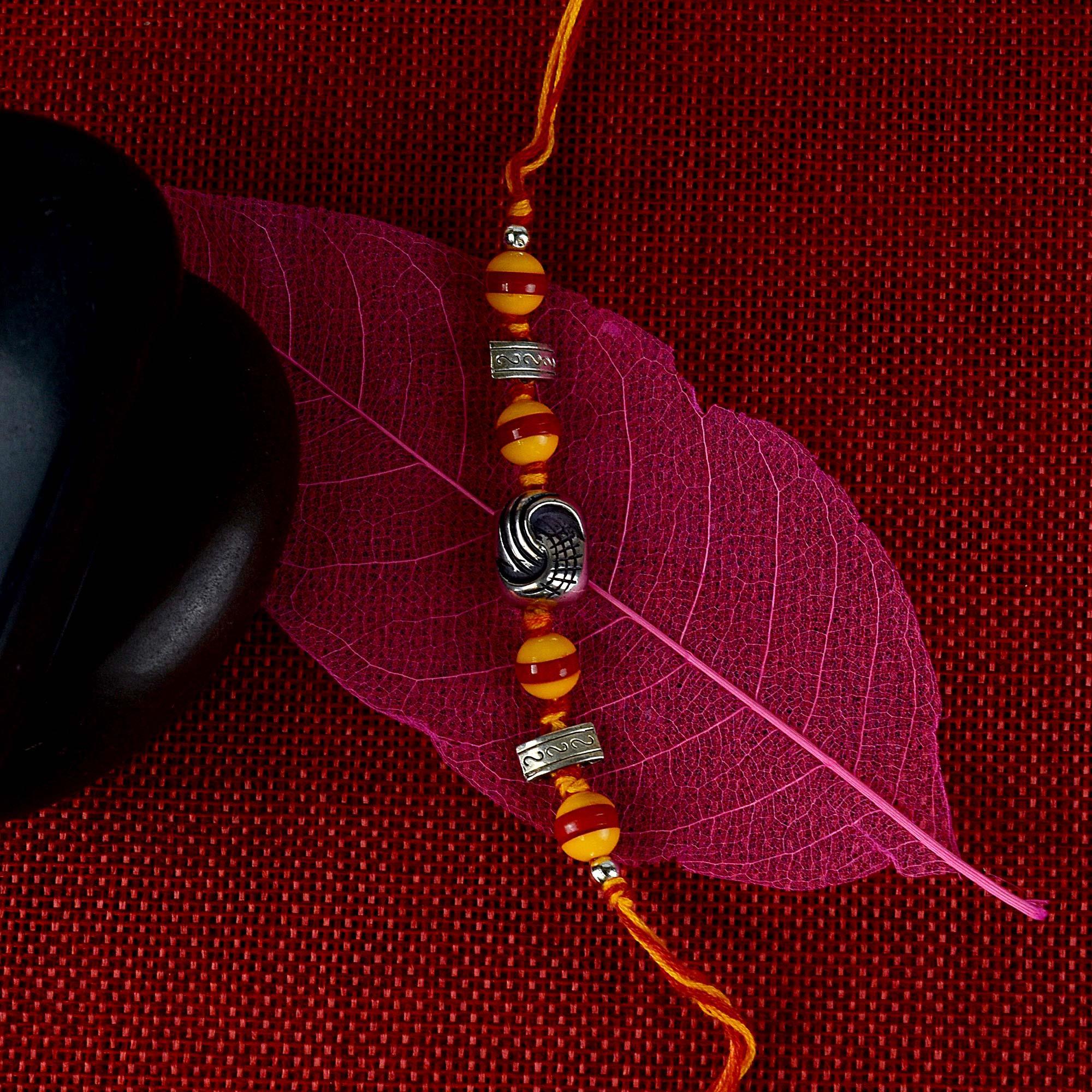 Antique Silver Metal Rakhi with Mauli Bead | Designer Rakhi