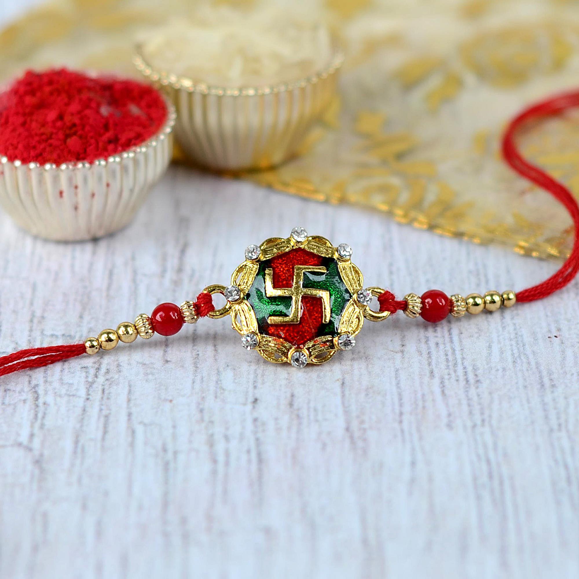 Fascinating Red and Green Swastik Rakhi | Rakhis
