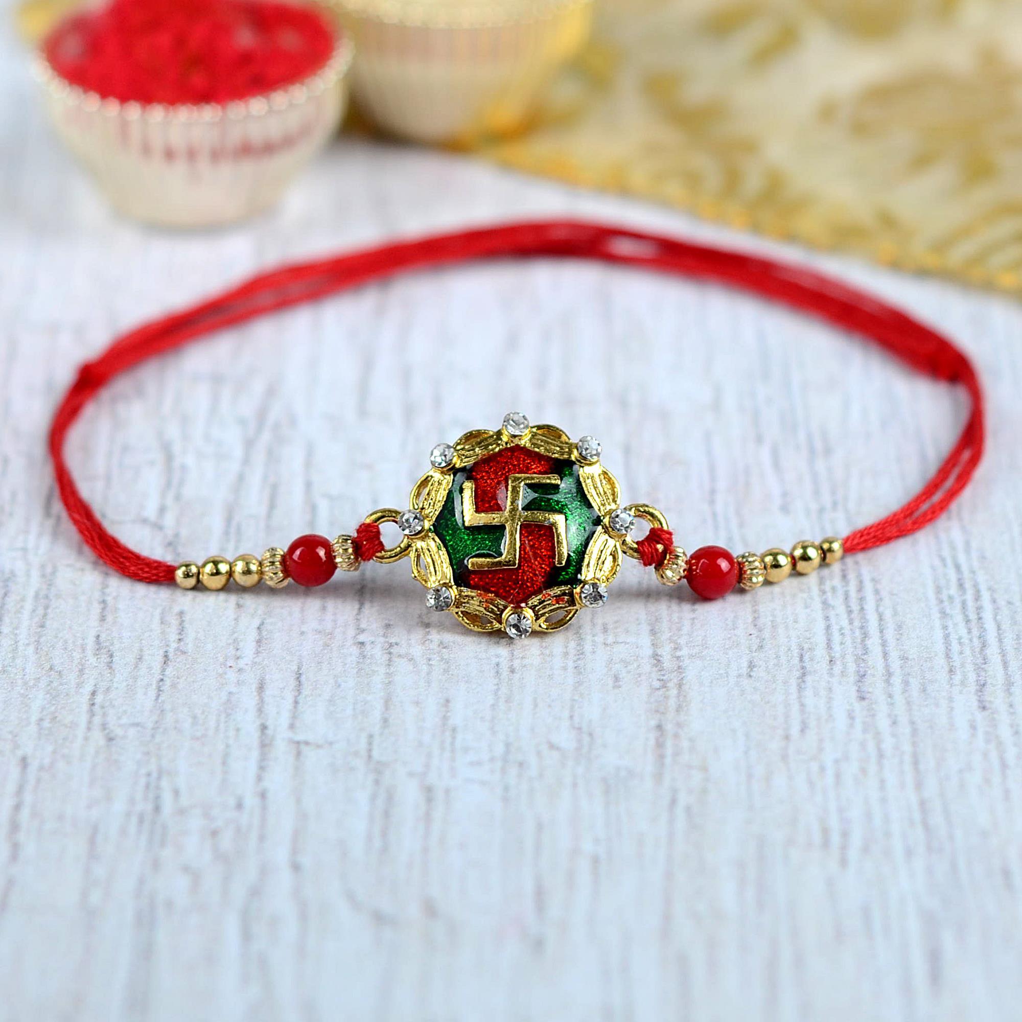 Fascinating Red and Green Swastik Rakhi | Rakhis