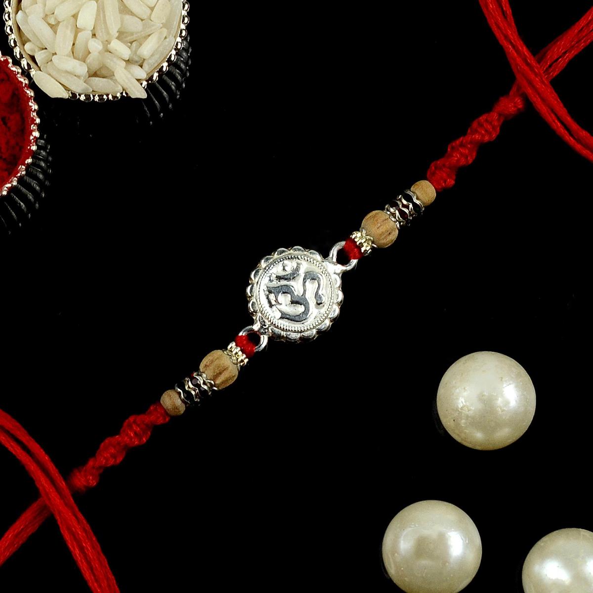 Real Silver Moulded Om Rakhi Red | Premium Rakhi