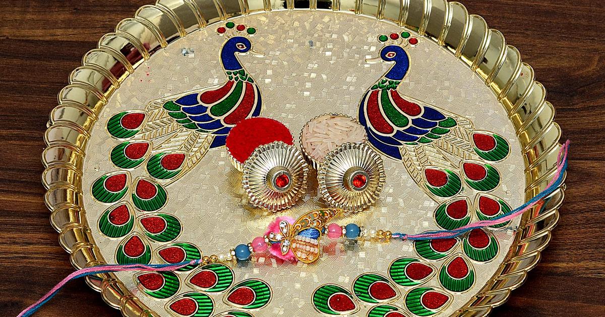 Colorful Rakhi With Roli Chawal on a Round Thali, | Rakhi Thali