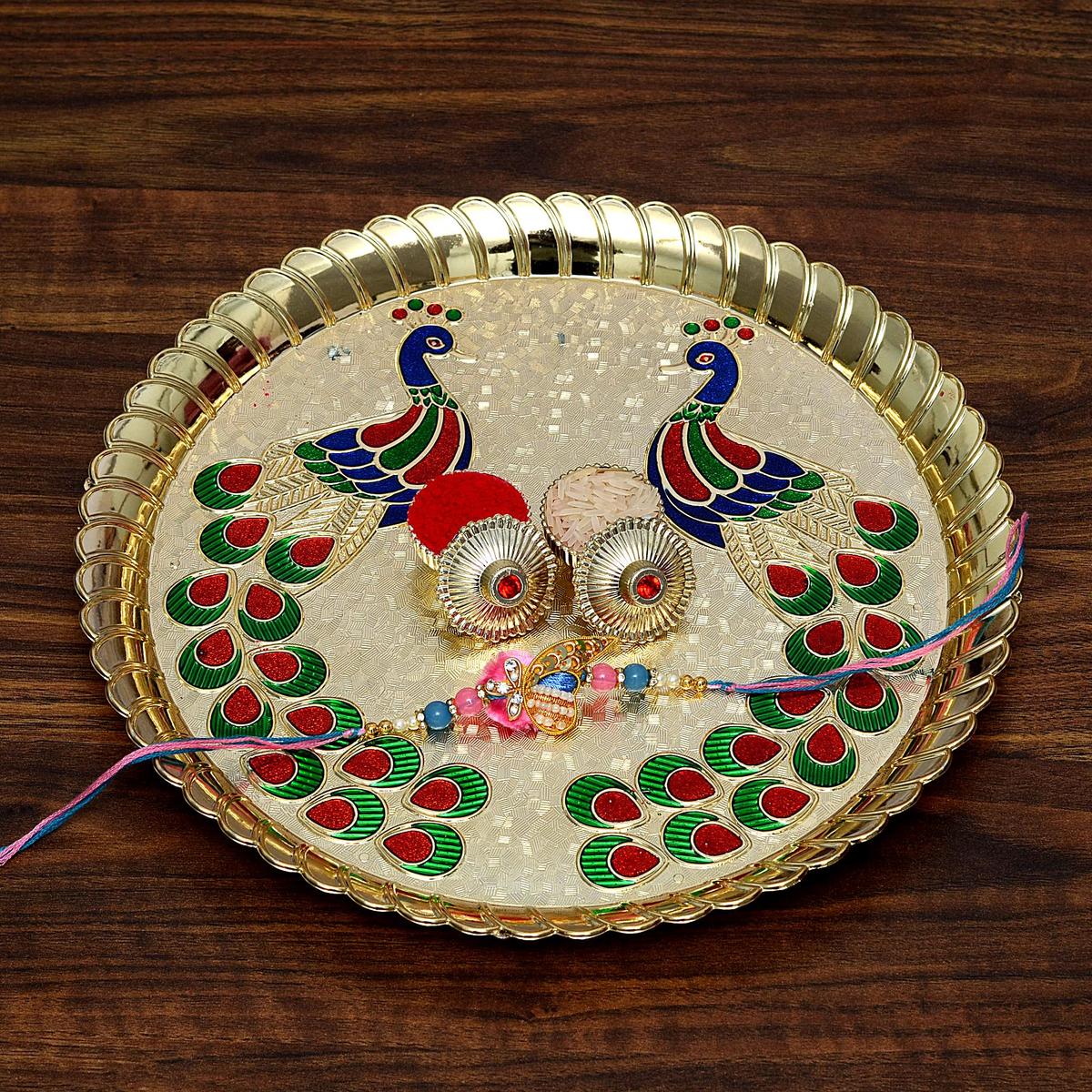 Colorful Rakhi With Roli Chawal on a Round Thali, | Rakhi Thali
