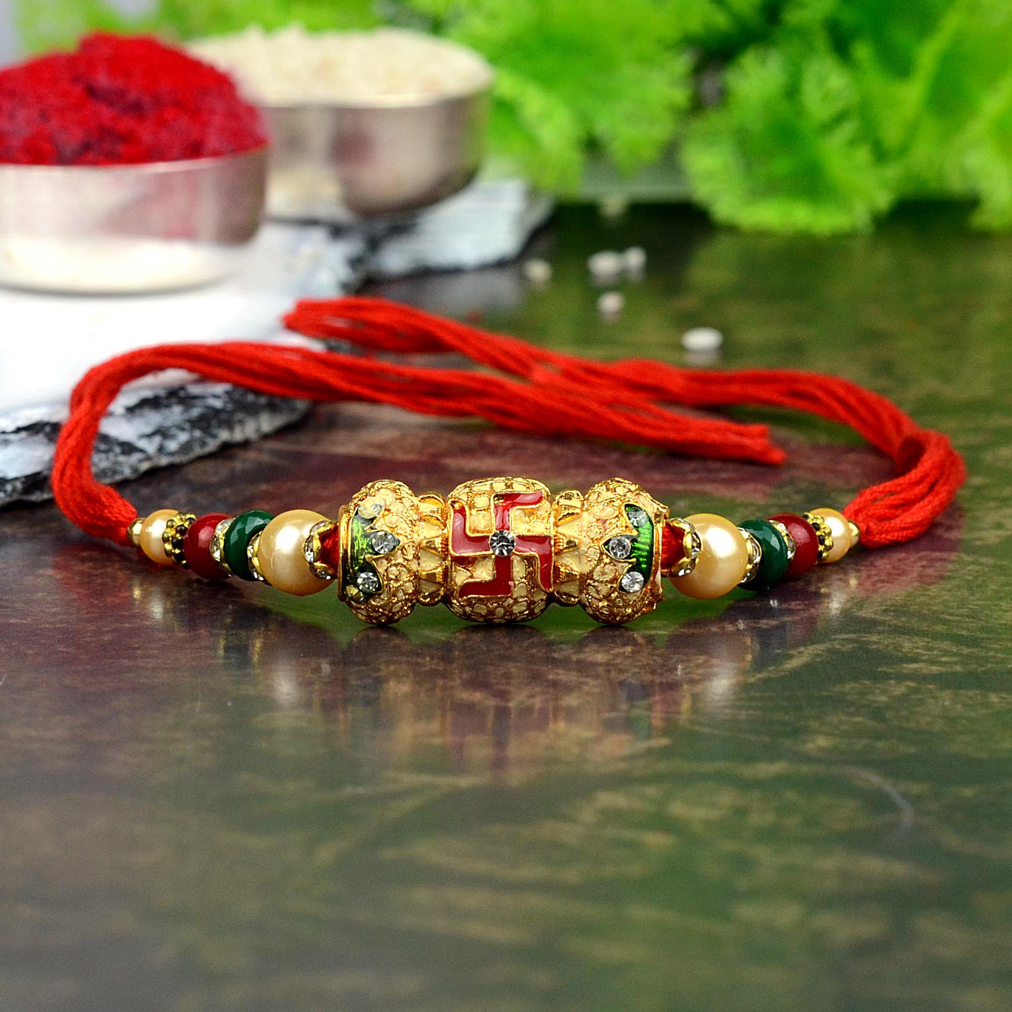 Swastik on Pillar Rakhi | Divine Rakhi