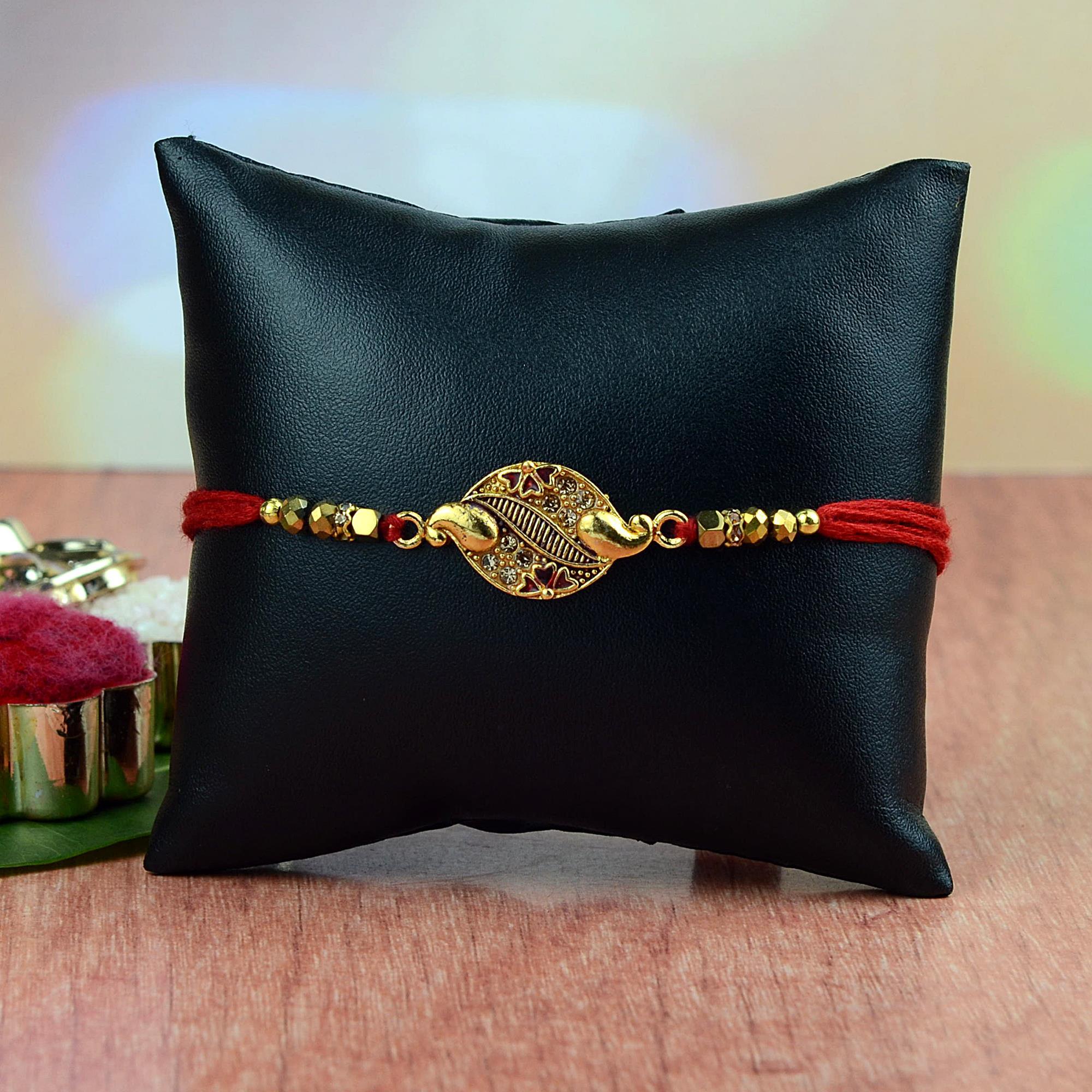 Yellow Metal Rakhi Design | Rakhis