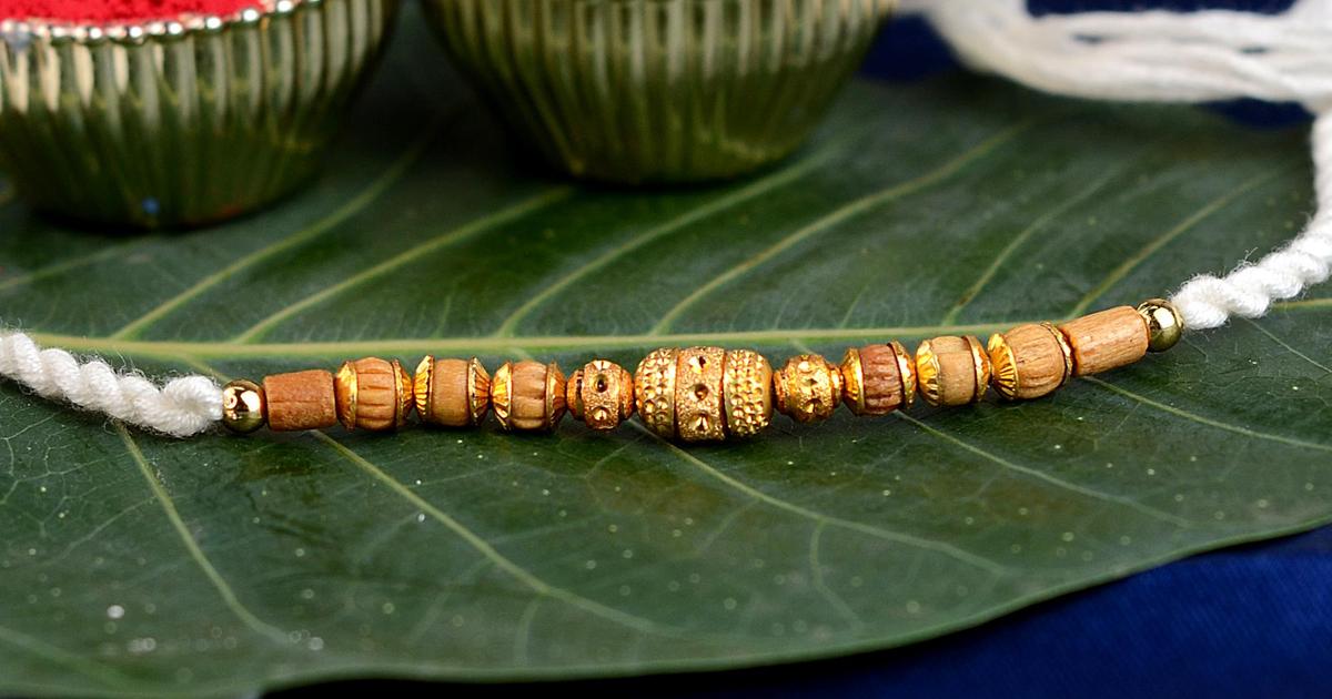 Ornate Gold Tulsi White Rakhi | Rakhi Dori