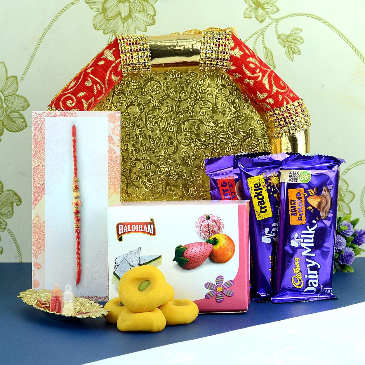 Send Sweet Hampers on Rakhi to India. Send Indian Mithai