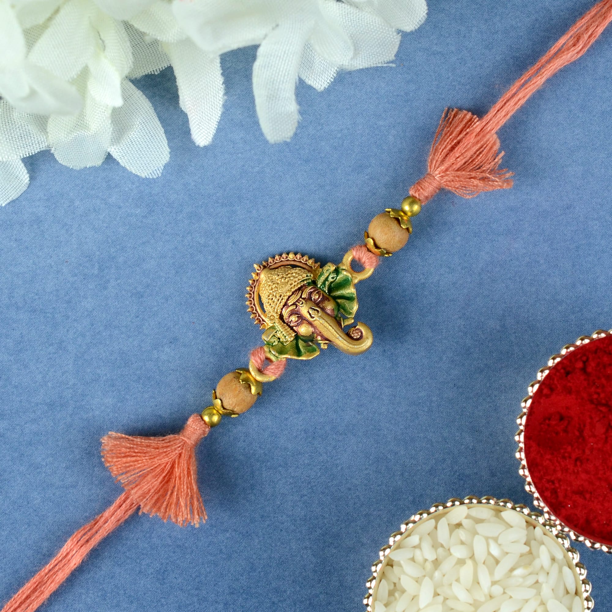Gorgeous Ganesh Peach Rakhi | Rakhi to Panchkula