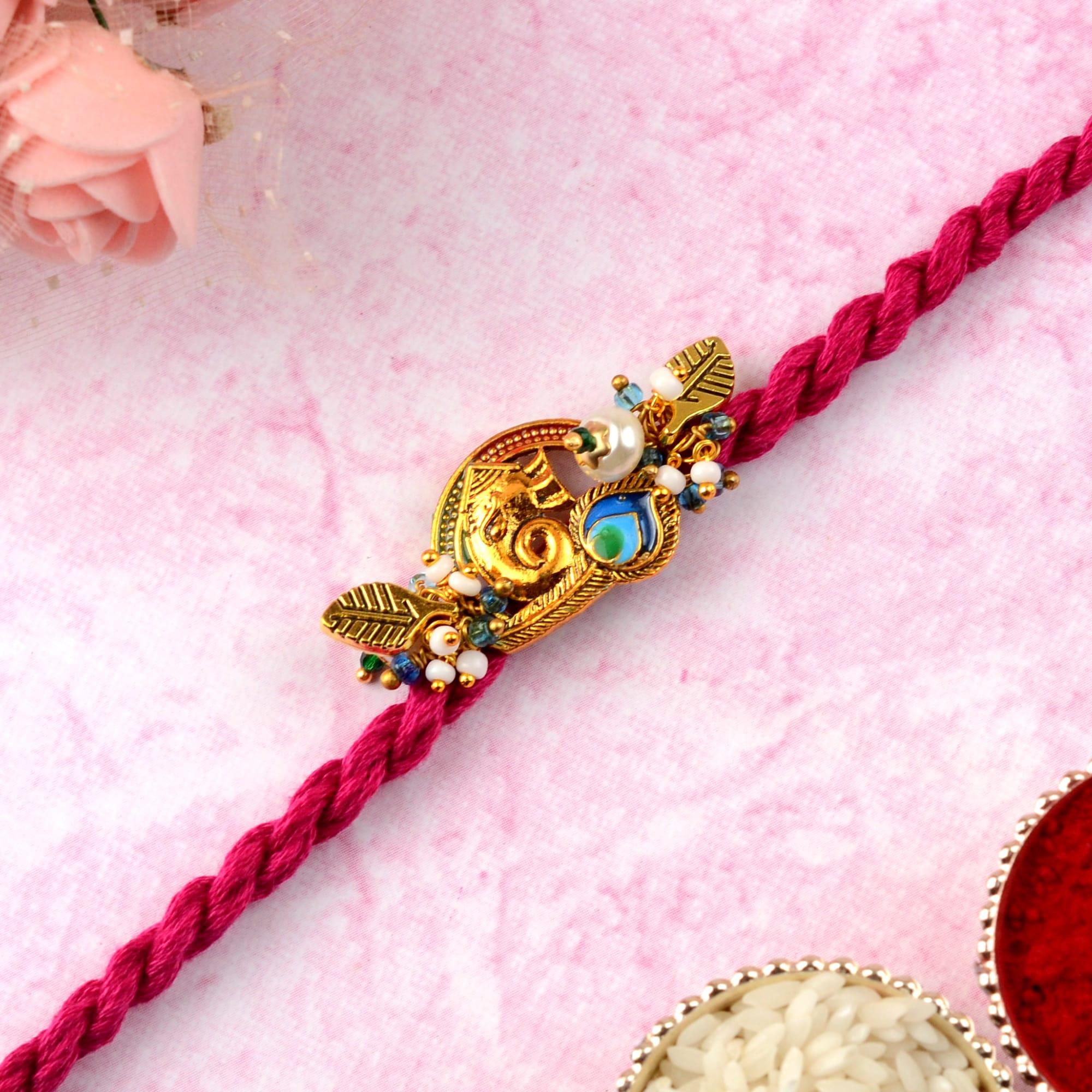 Peacock Feather Ganesha Rakhi | Ganesh Rakhis