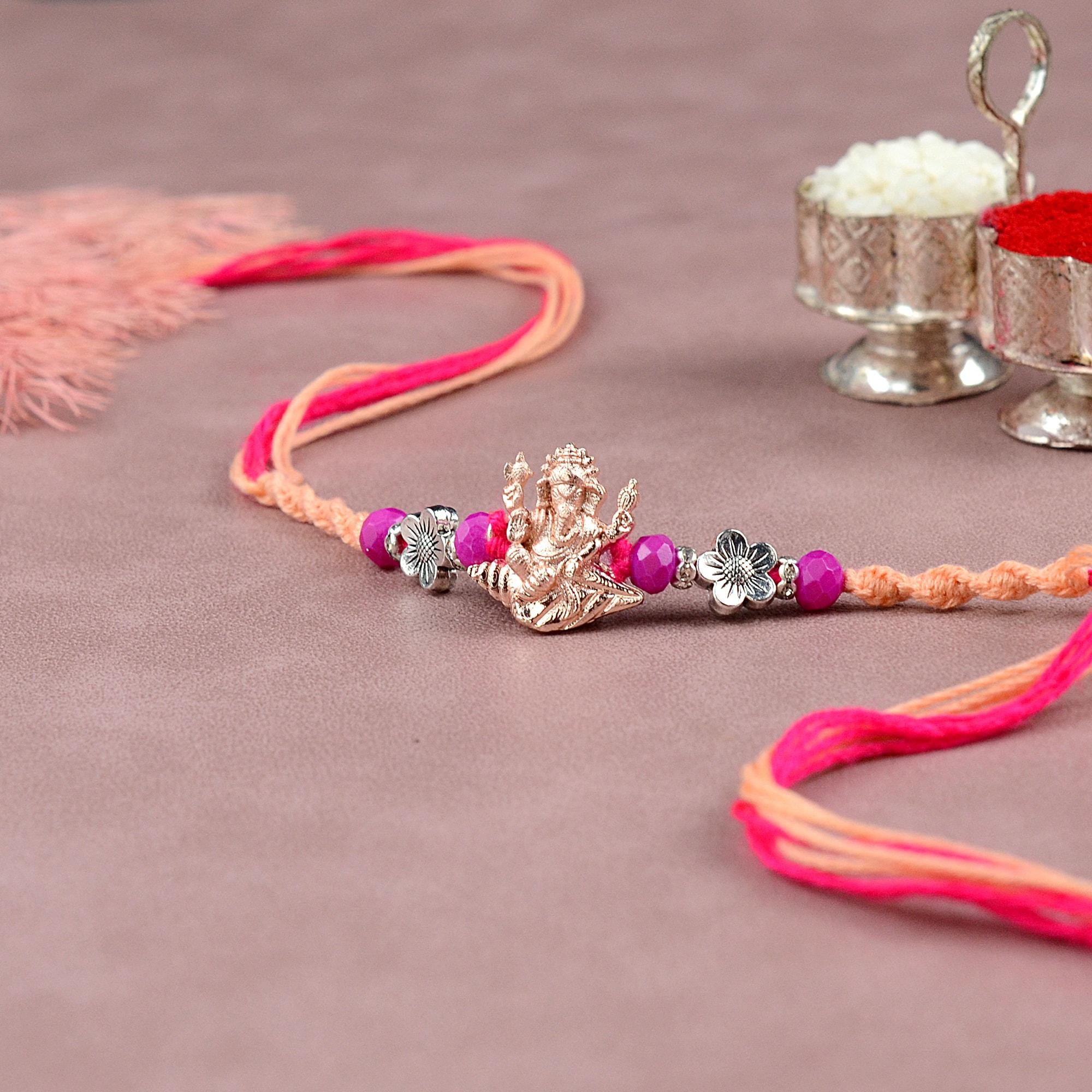 Rose Gold Ganesh on Shankh Rakhi | Ganesh Rakhis