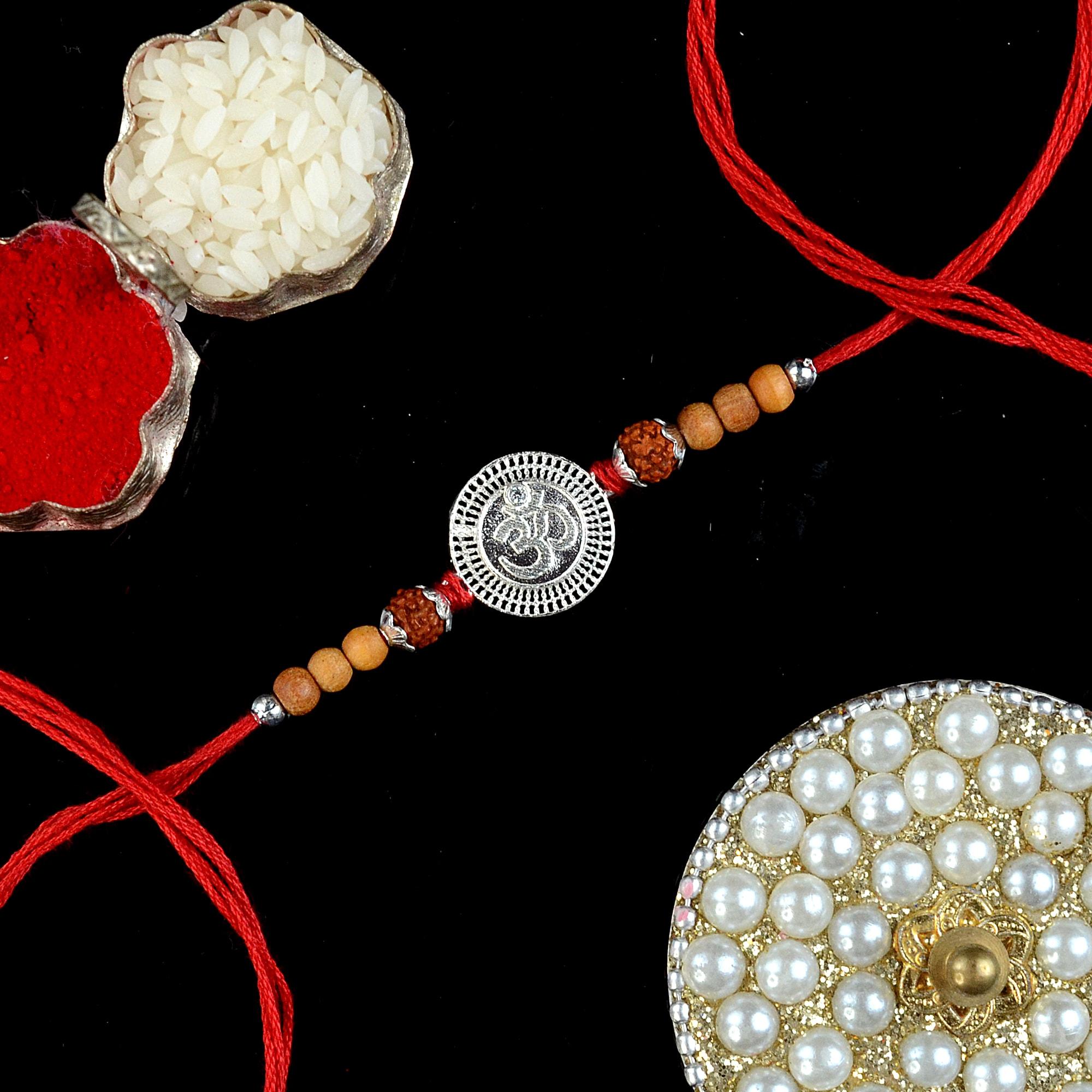 Beautiful Etched Om AD Rakhi | Om Rakhi
