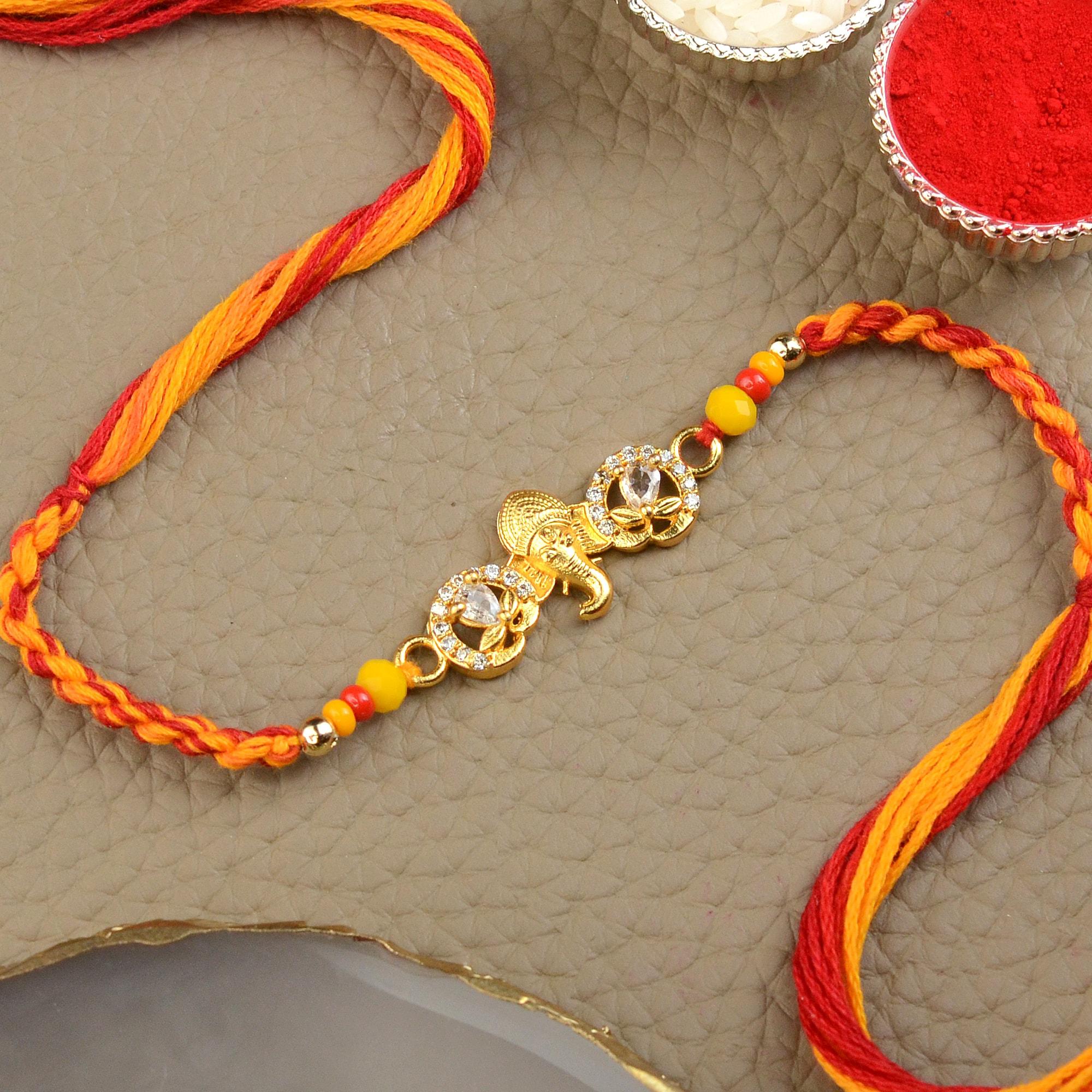 Golden Ganesh Head Flowers Rakhi | Ganesh Rakhis