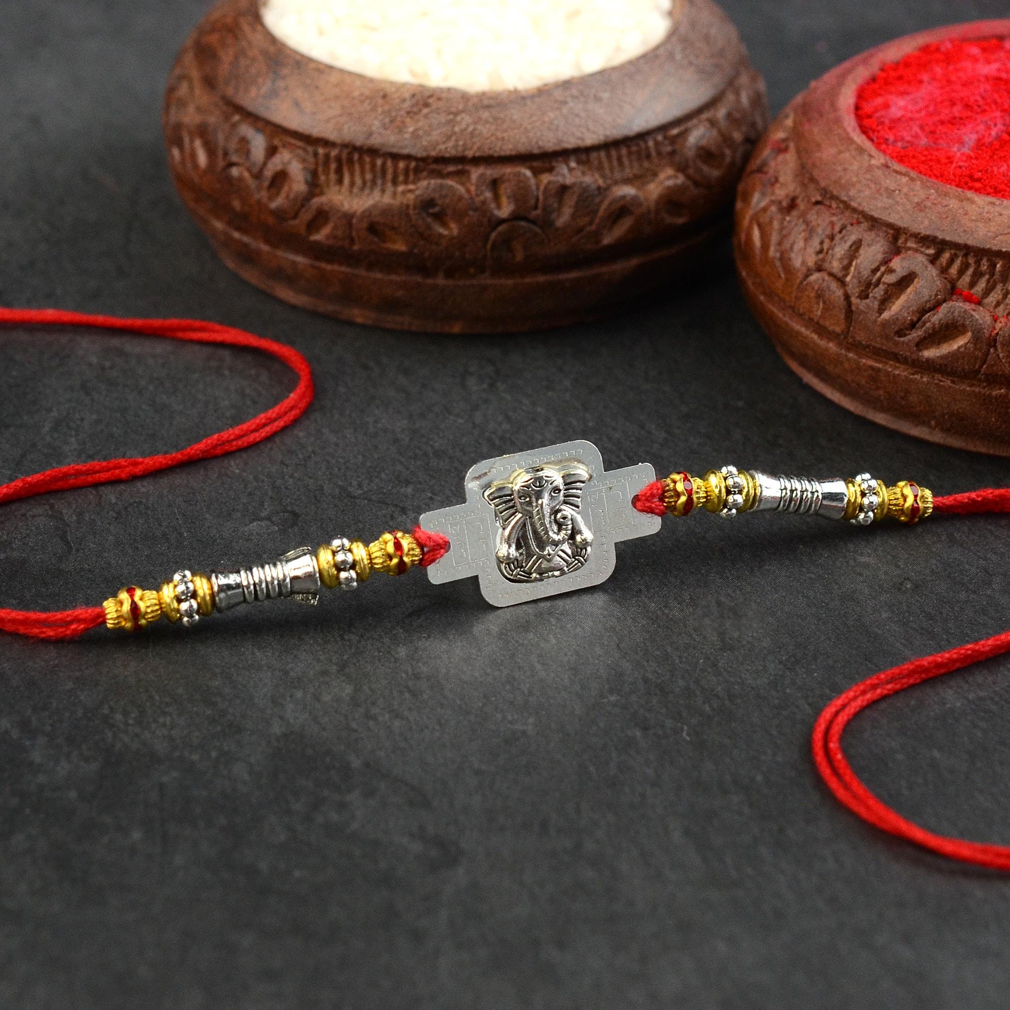 Antique Ganesh on Placard Rakhi | Ganesh Rakhis