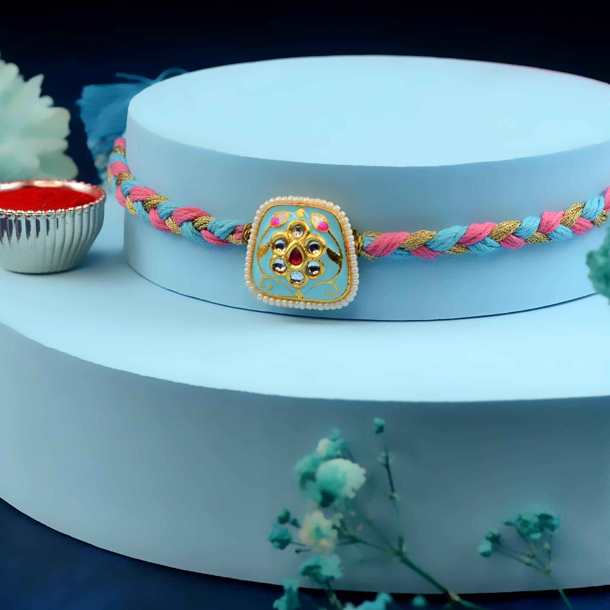 Elegant Sky Blue Motif Rakhi | Designer Rakhi